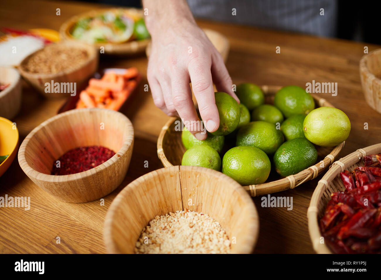 Male Hand Picking Lime Stock Photo - Alamy