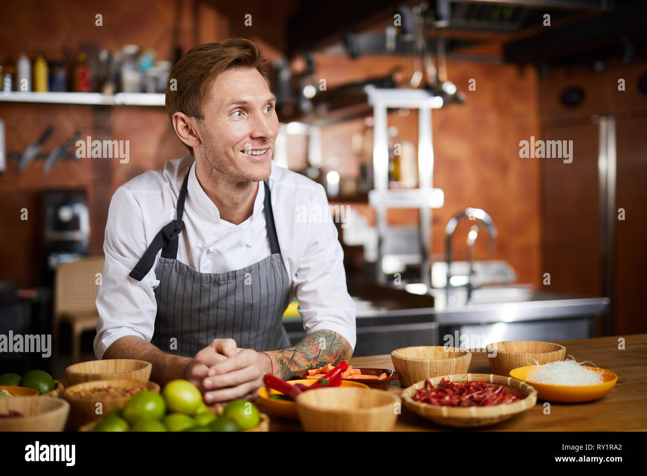 Young professional male chef hi-res stock photography and images - Alamy