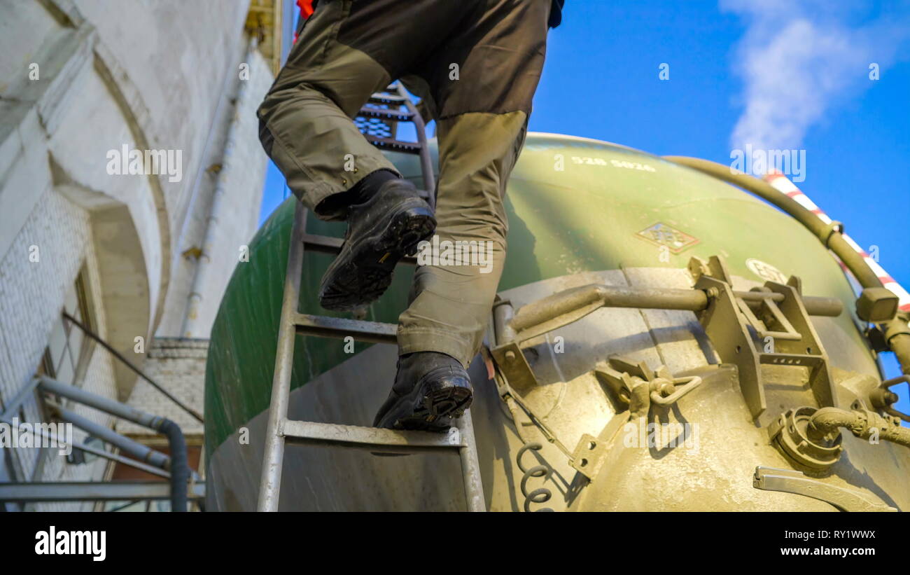 Going down ladder hi-res stock photography and images - Alamy