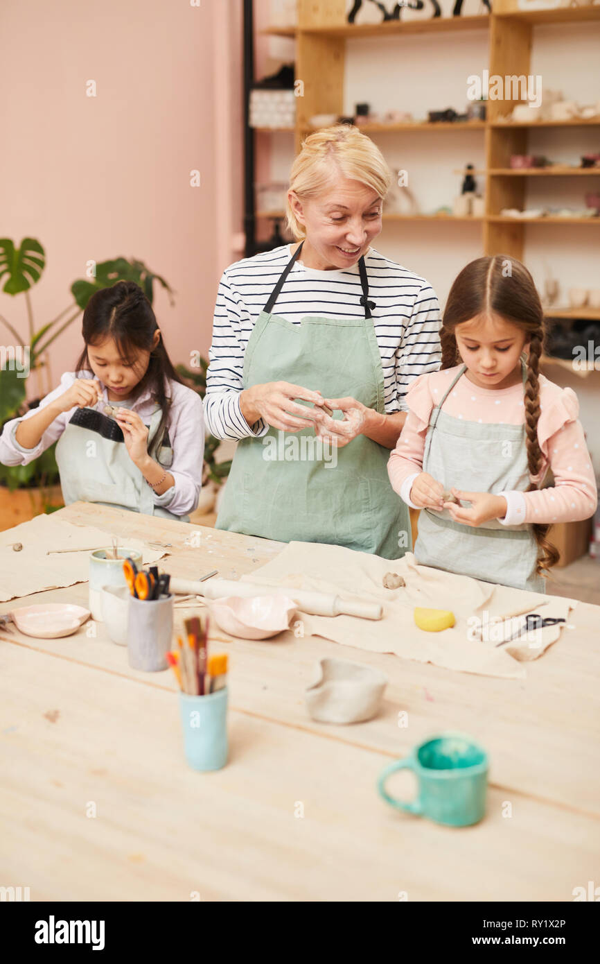 Little Girls in Pottery Workshop Stock Photo - Alamy