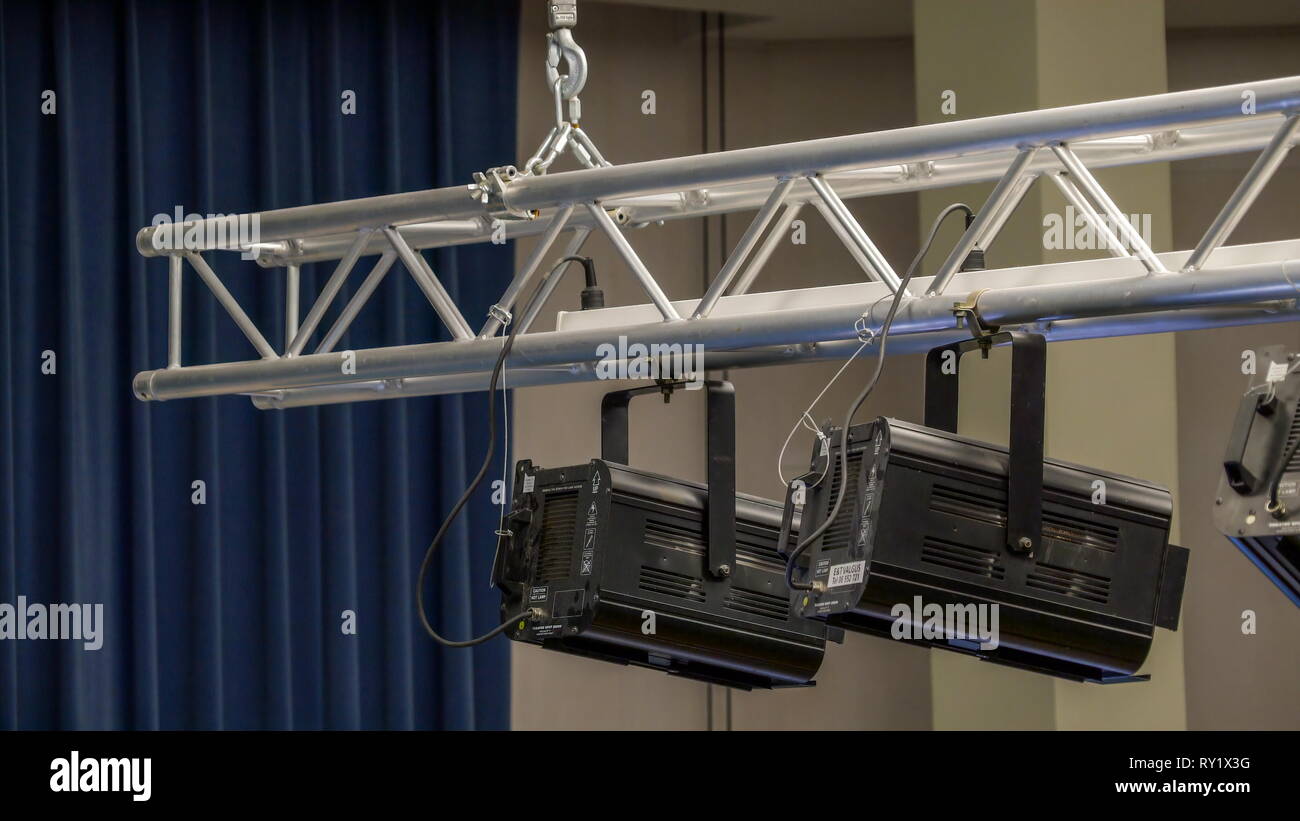 Three of the many lights on the stage where there are performers to do ...