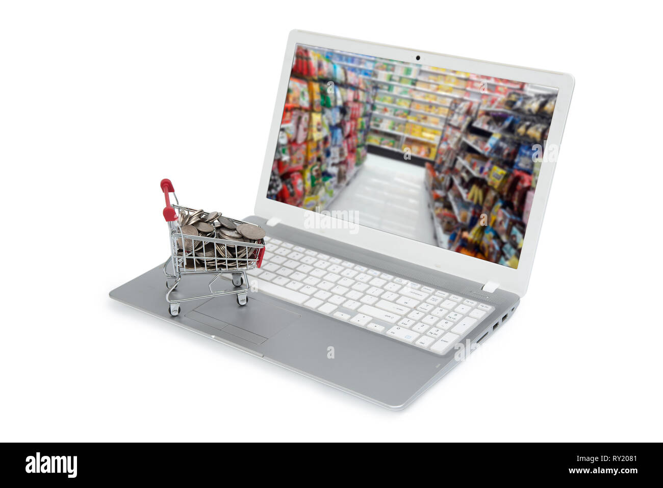 Internet online shopping concept with computer and cart Stock Photo - Alamy