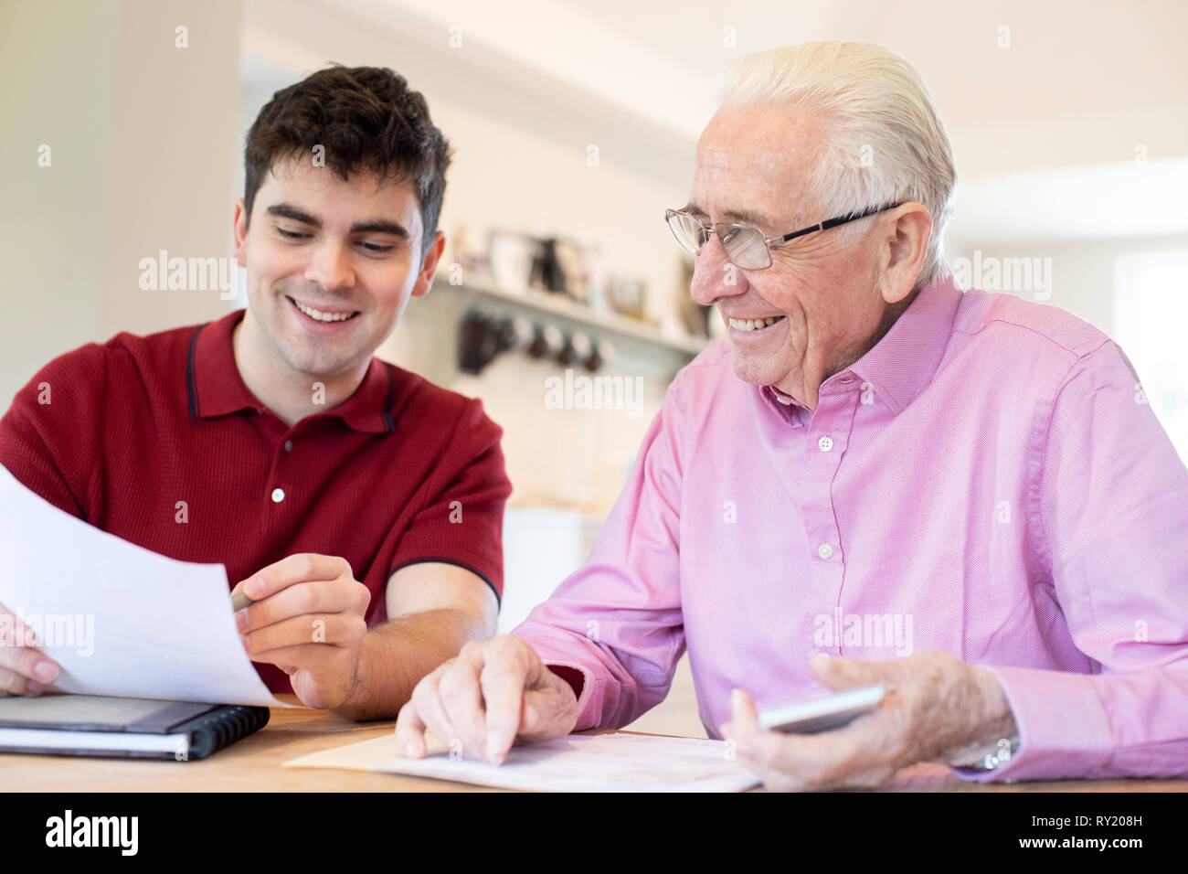 Helping hand and home hi-res stock photography and images - Alamy