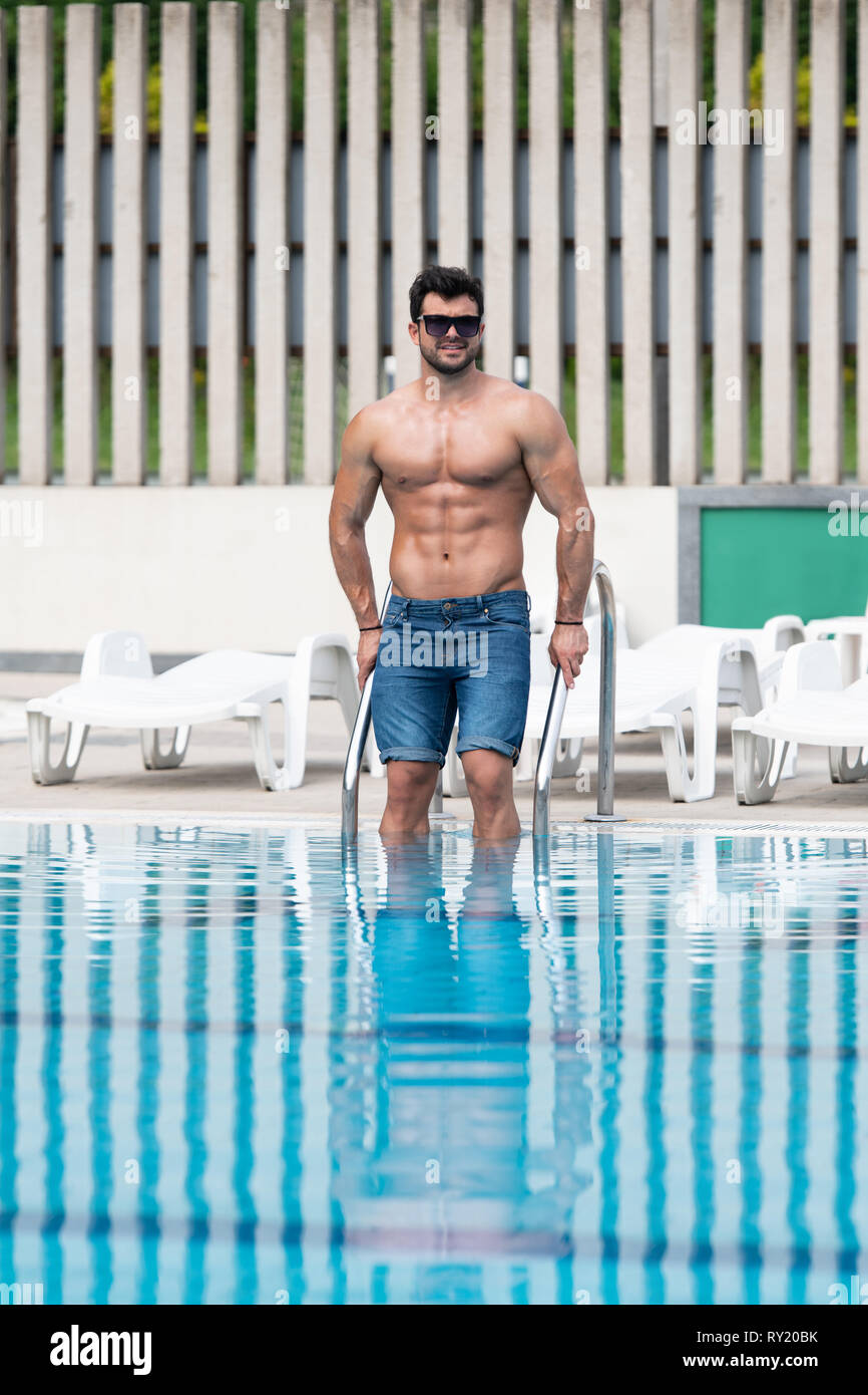 Young Healthy Good Looking Macho Man Model Athlete At Swimming Outdoor ...
