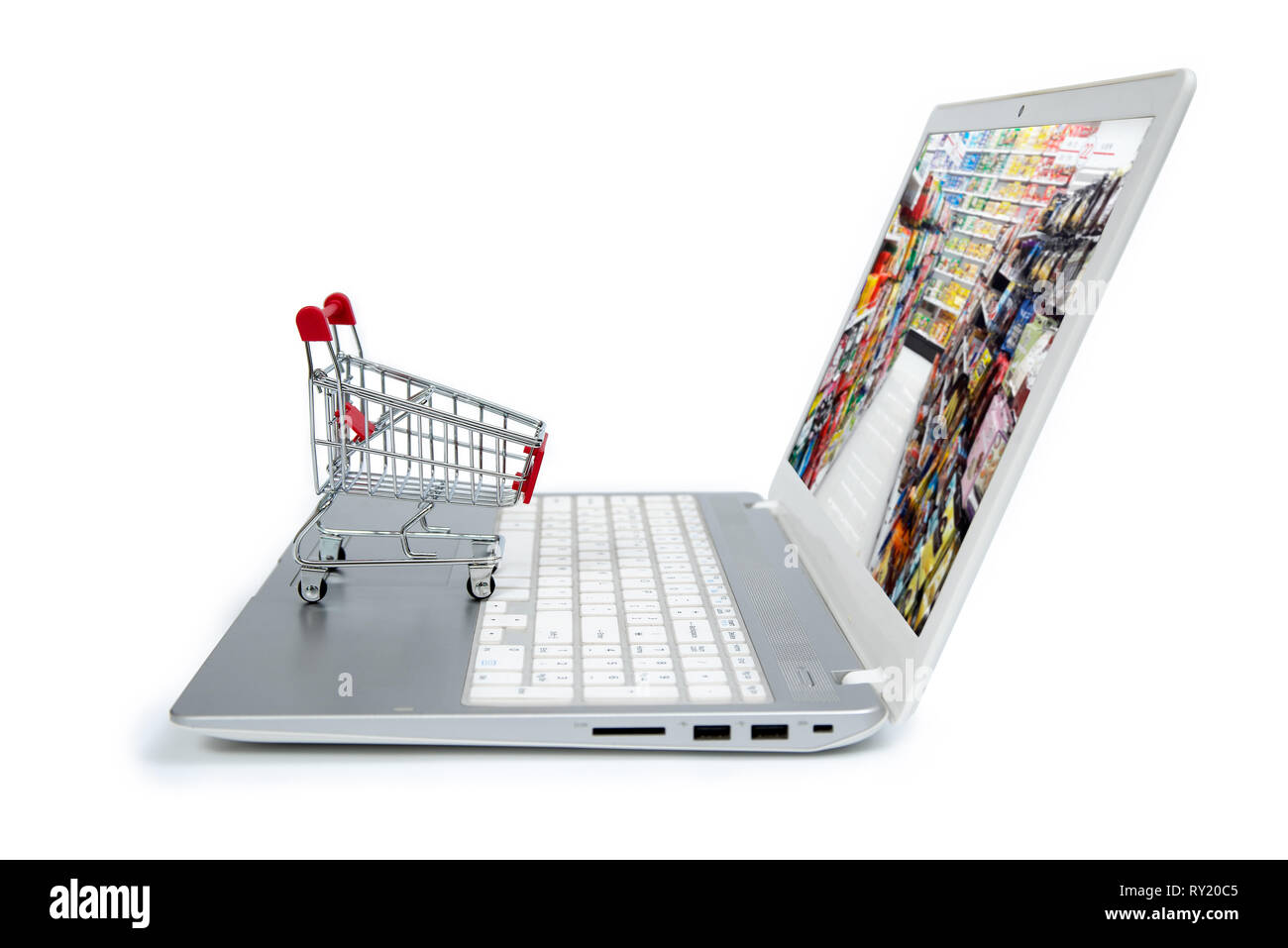 Laptop computer shopping basket hi-res stock photography and images - Alamy