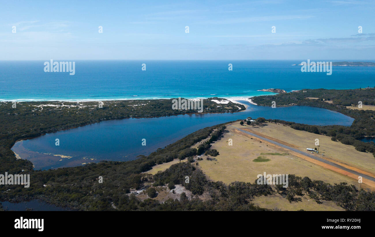 Aerial shot of a beach with an airstrip Stock Photo - Alamy