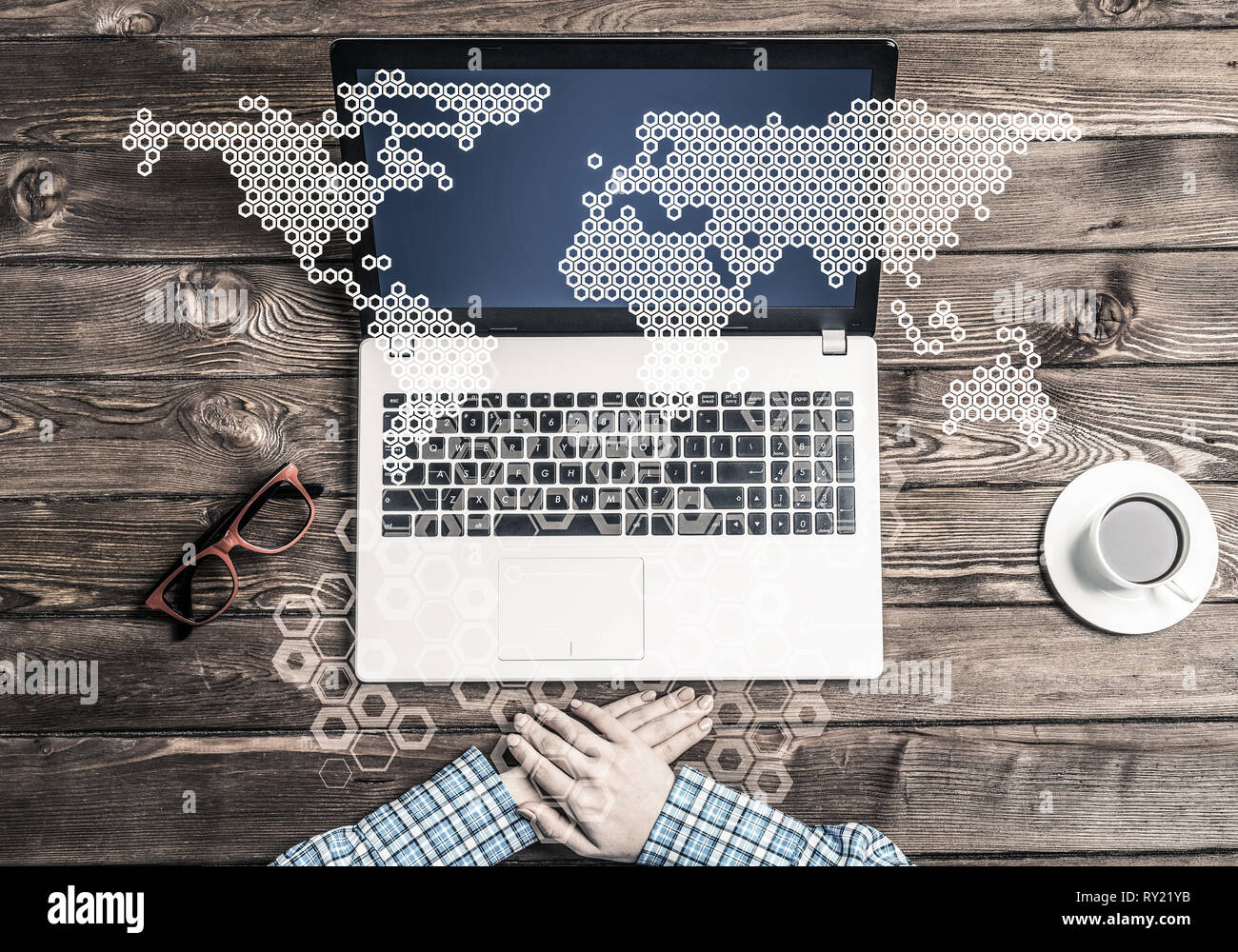 Business workplace with laptop device coffee cup and media user ...