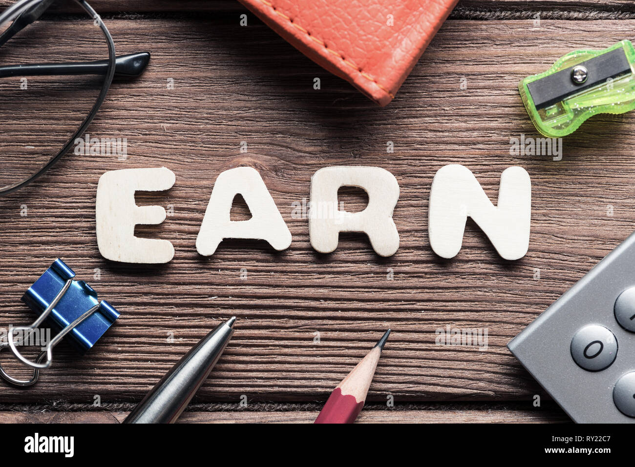 Earn word hi-res stock photography and images - Alamy