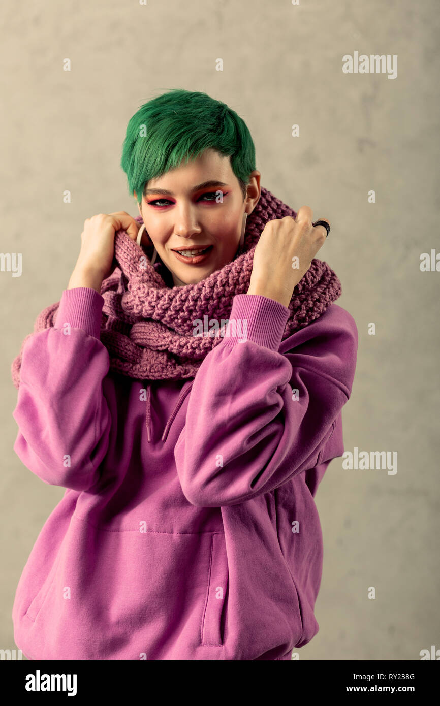 Nice attractive young woman wearing warm clothes Stock Photo - Alamy