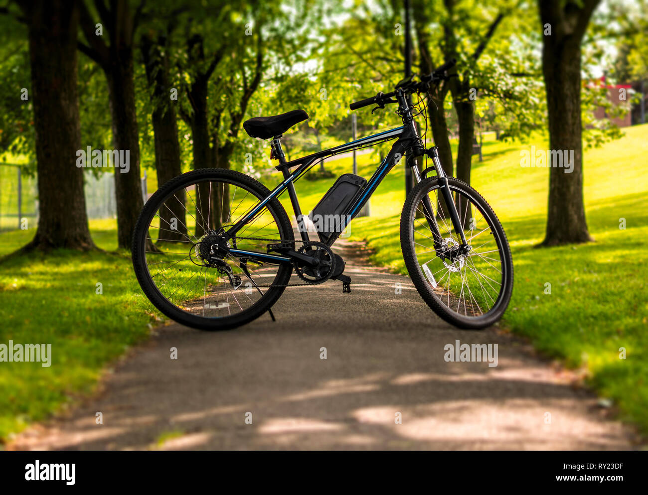Electric bicycle in park sunny hi-res stock photography and images - Alamy