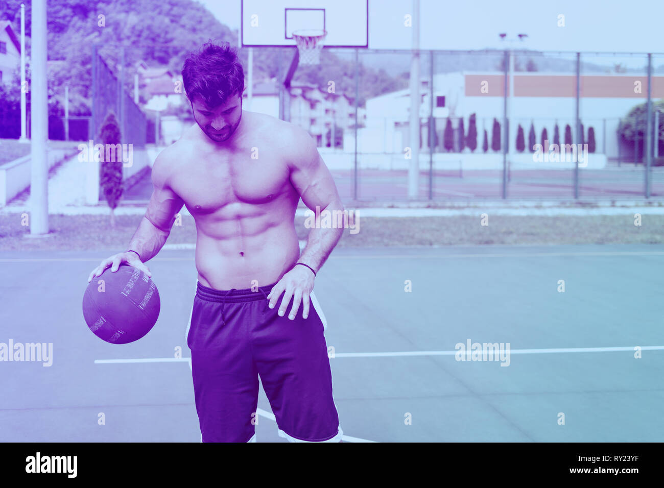 Basketball Player Bodybuilder Practicing And Posing For Basketball And ...