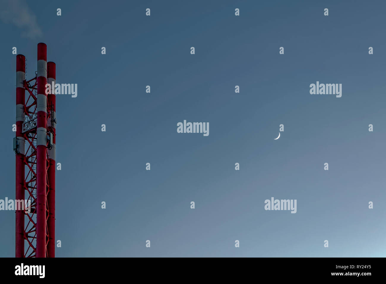 pipes of the heat station on the background of the sunset sky and the ...