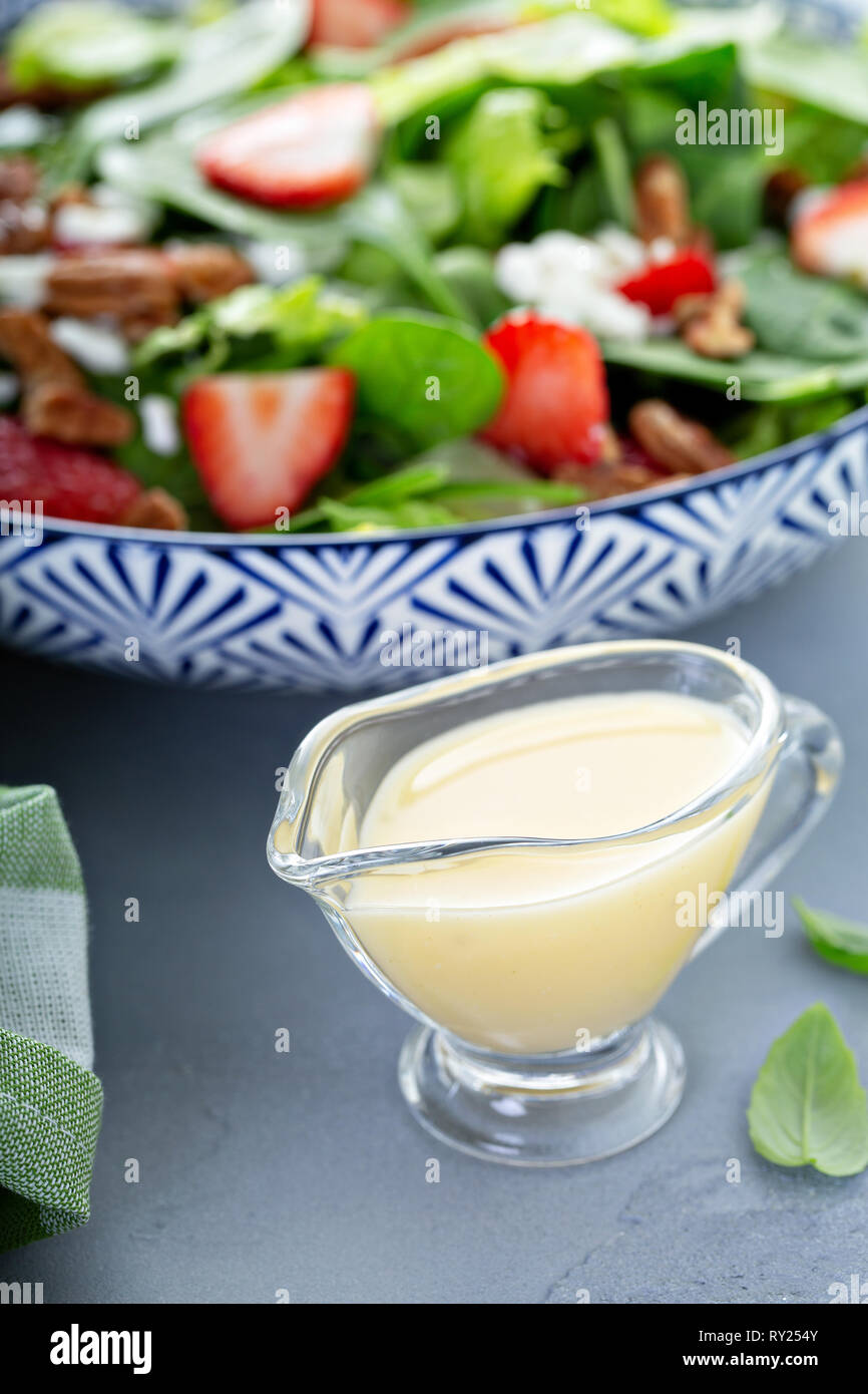 Italian dressing in a small sauce dish Stock Photo - Alamy