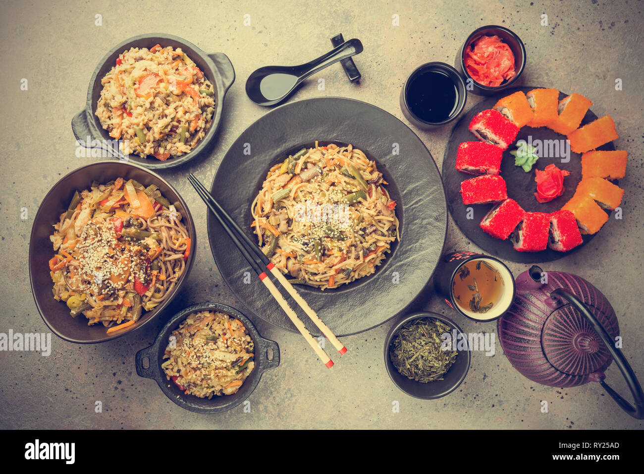 Asian food set served on gray stone background, top view. Chinese ...