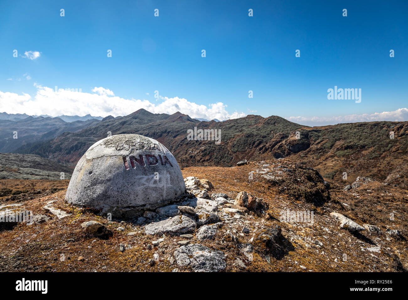 The peaceful India Bhutan border pillar stone on the border of ...