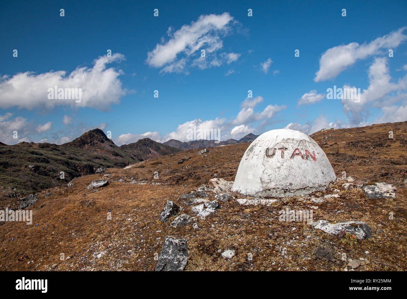 The peaceful India Bhutan border pillar stone on the border of ...
