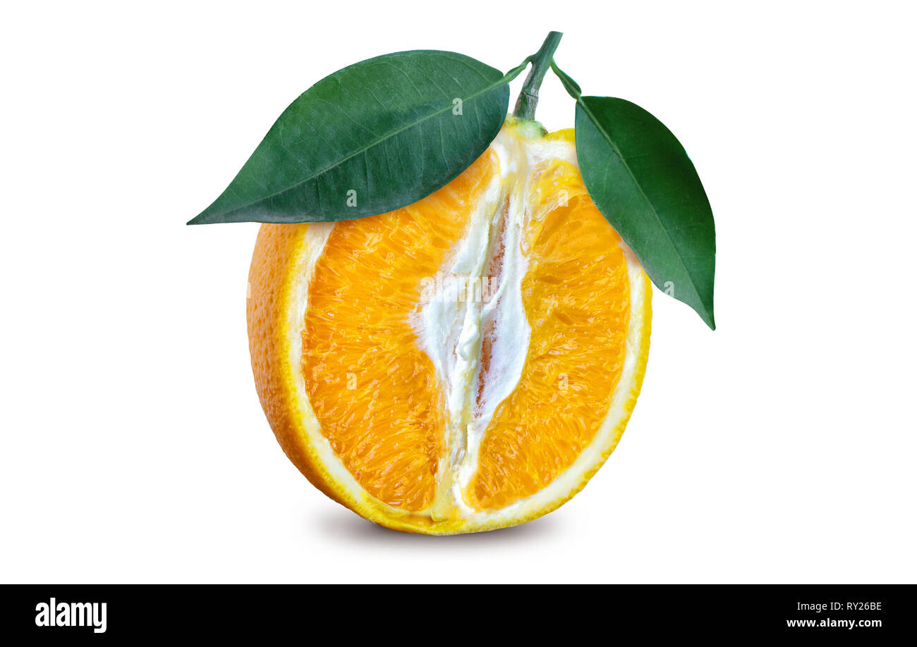 Half ripe orange with two leaves isolated on white background Stock ...
