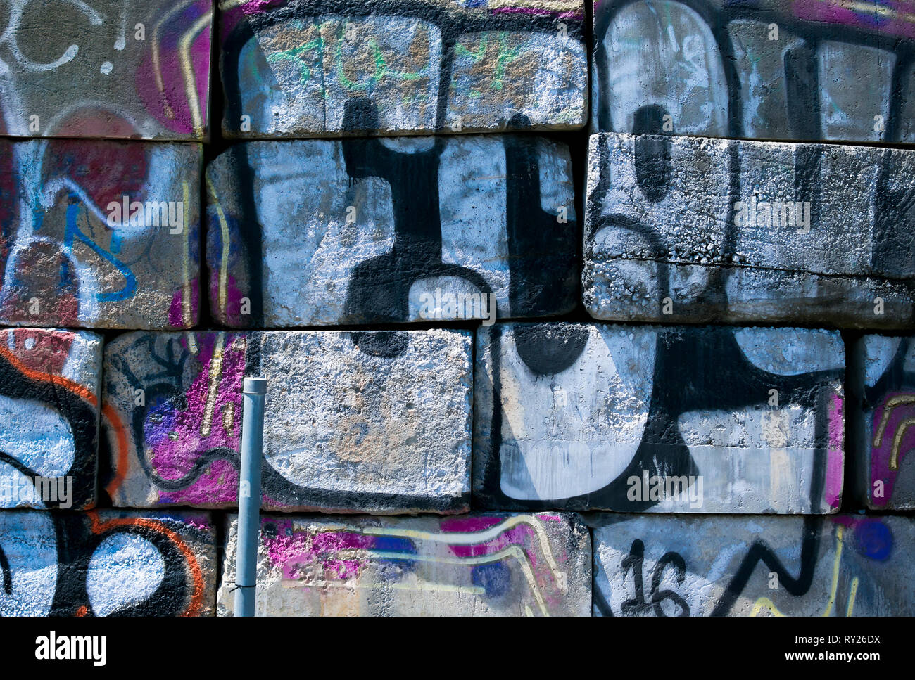 Street graffiti on a big stone wall Stock Photo - Alamy