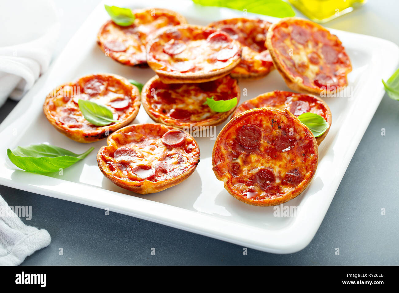 Mini pepperoni pizzas Stock Photo - Alamy