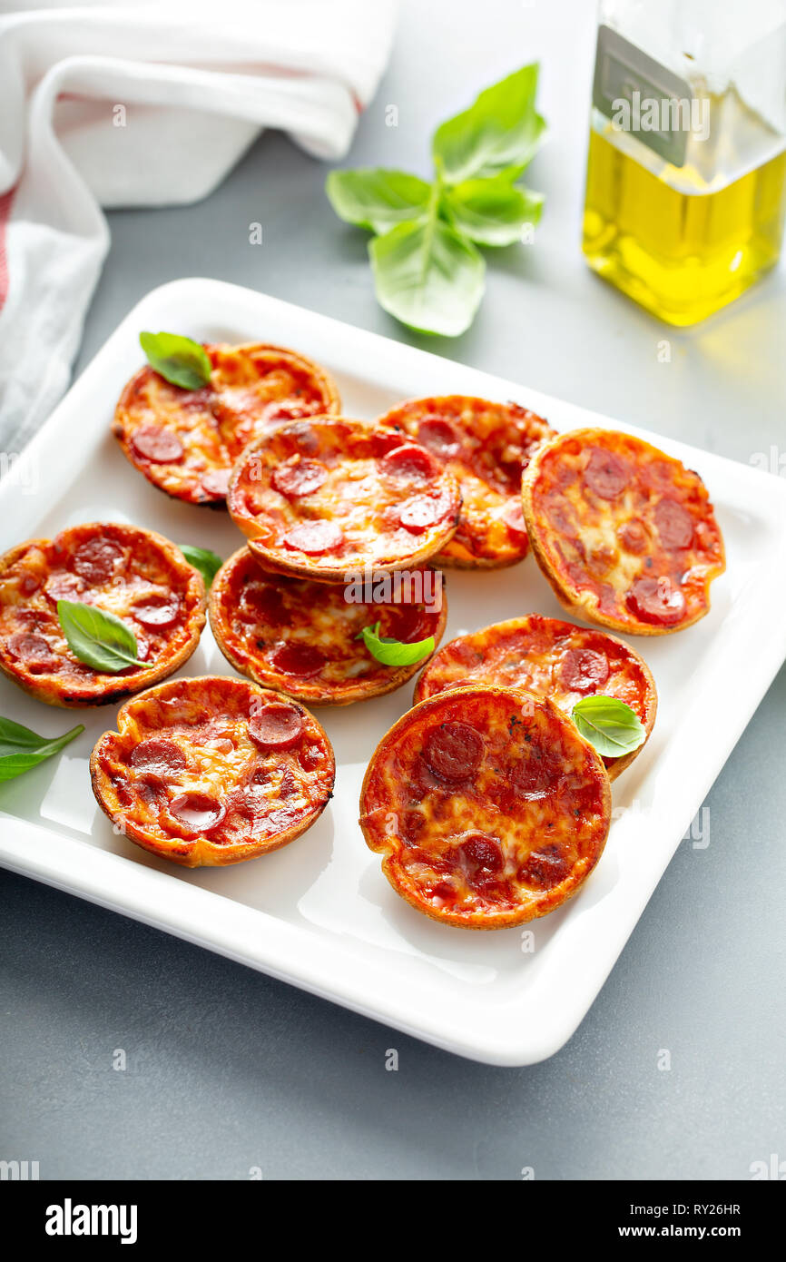 Mini pepperoni pizzas Stock Photo - Alamy