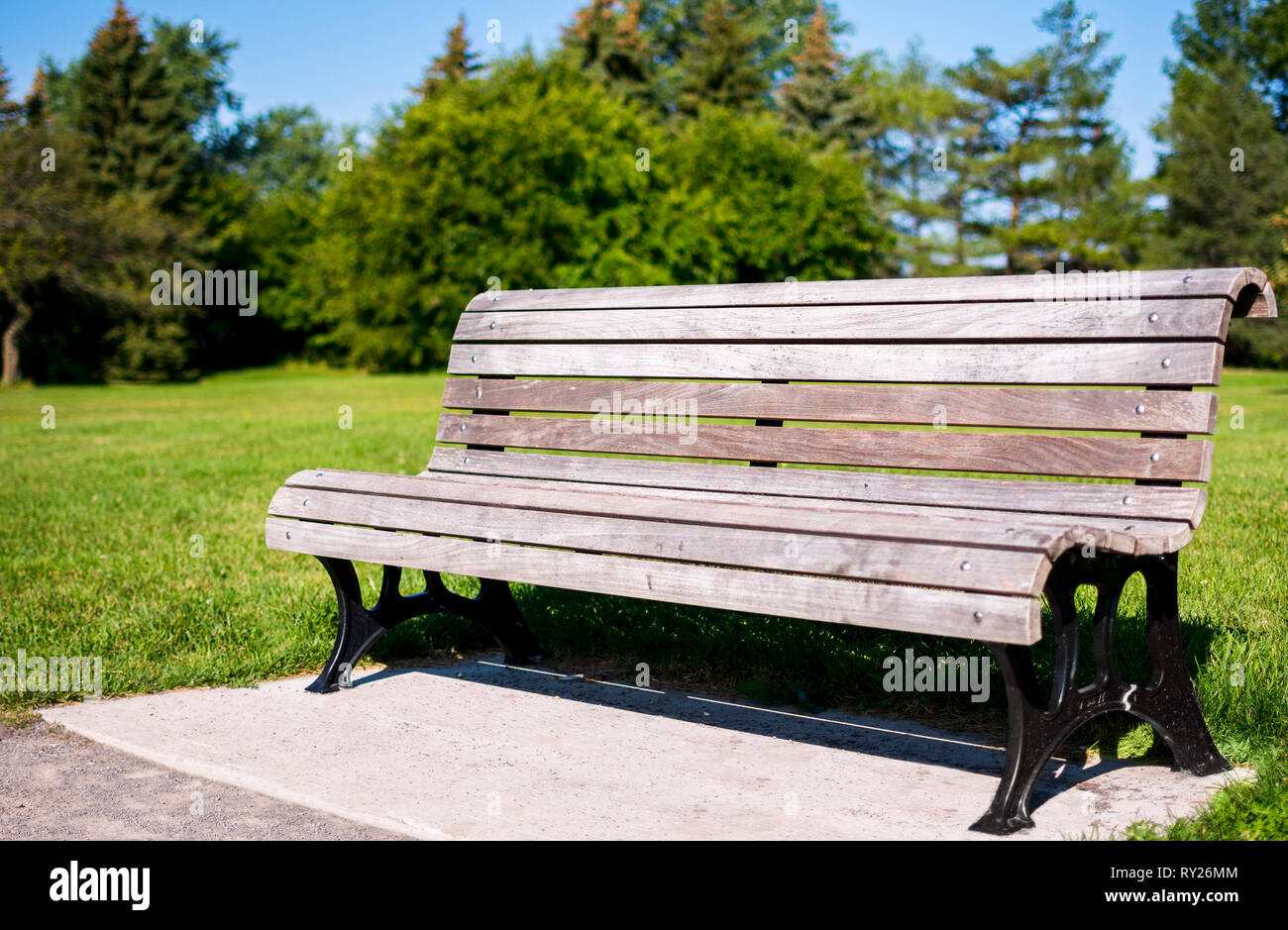 Simple bench in park hi-res stock photography and images - Alamy