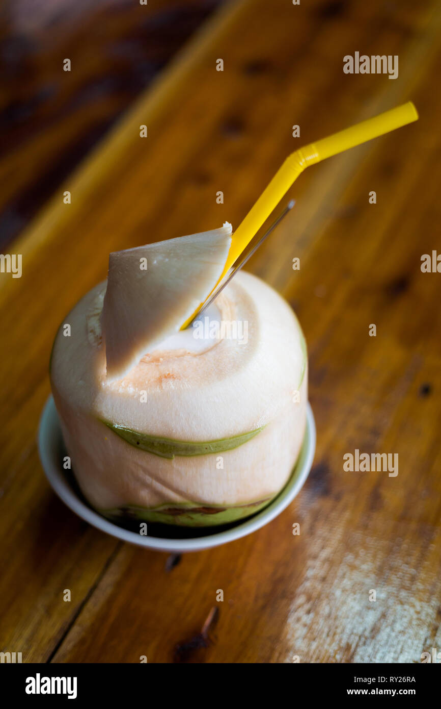 Fresh peeled young coconut on local market. Traditional thai fresh ...