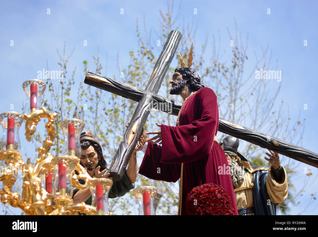 Jesus Christ with the cross in procession Stock Photo - Alamy