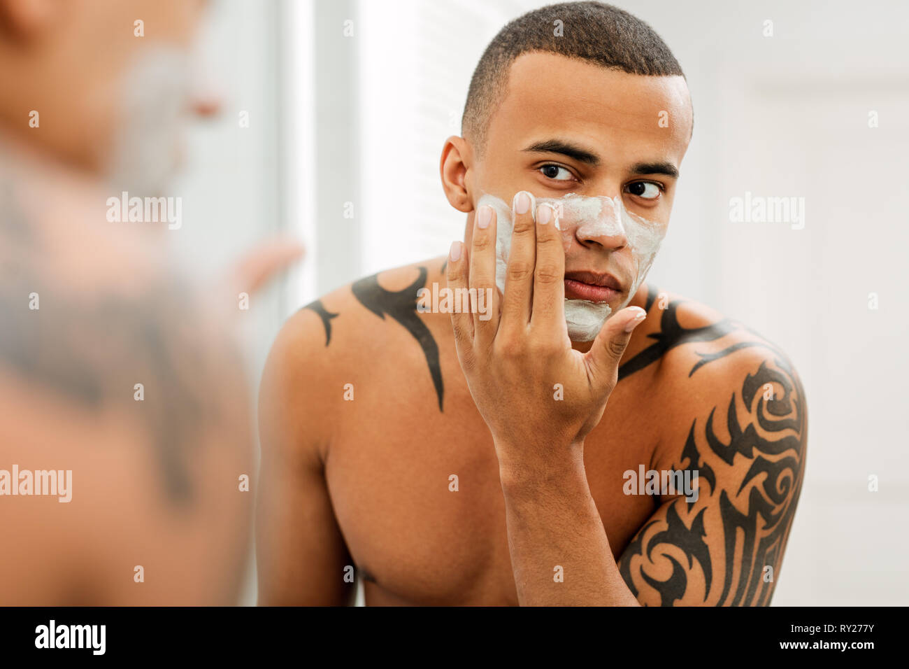 Man cream face wrinkles hi-res stock photography and images - Alamy