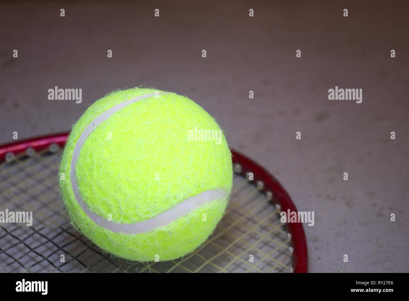 Tennis ball on racket hi-res stock photography and images - Alamy