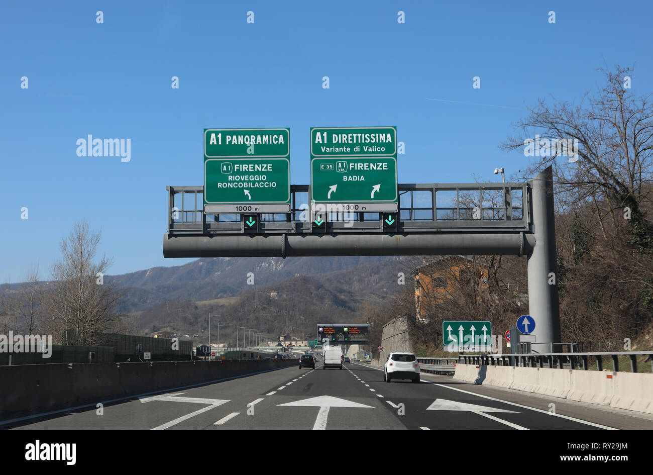 highway sign with the signs of the junction to go to Florence on the ...
