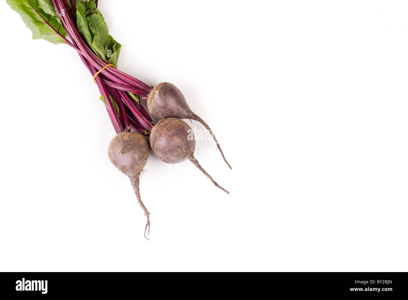 Bunch of organic beetroot isolated on white background Stock Photo - Alamy