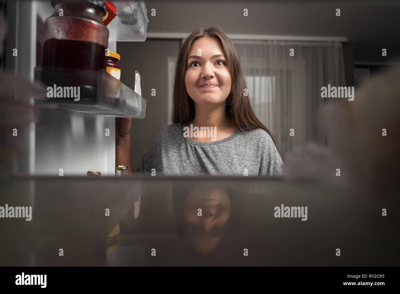 Woman fridge open from inside hi-res stock photography and images - Alamy