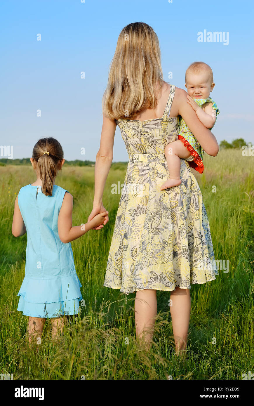 Woman and children and background hi-res stock photography and images ...