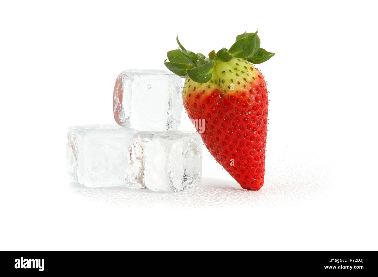 Fresh red strawberry with ice cubes isolated on white background Stock ...