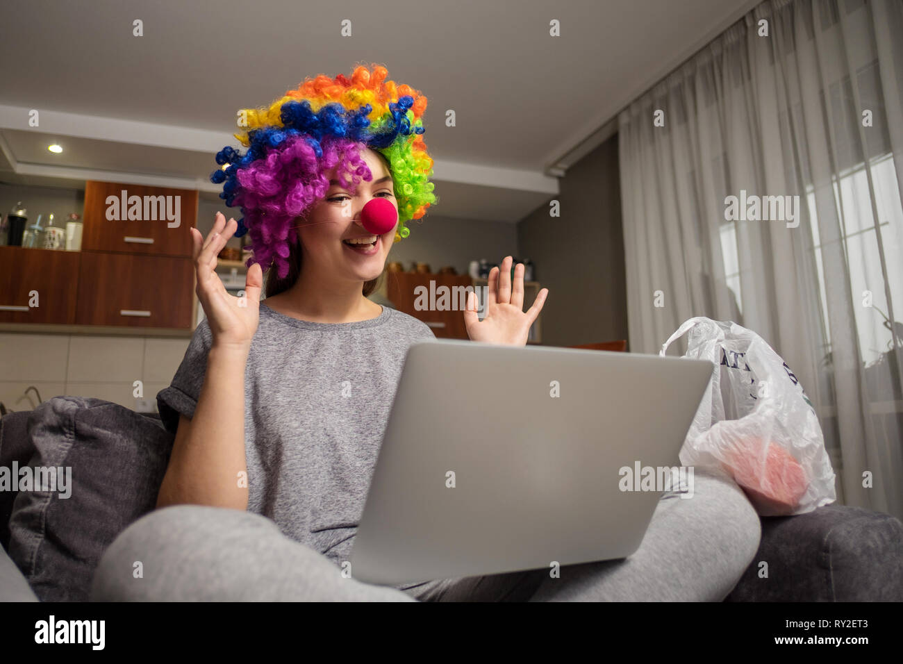 holiday greetings online, young woman communicates in social networks ...