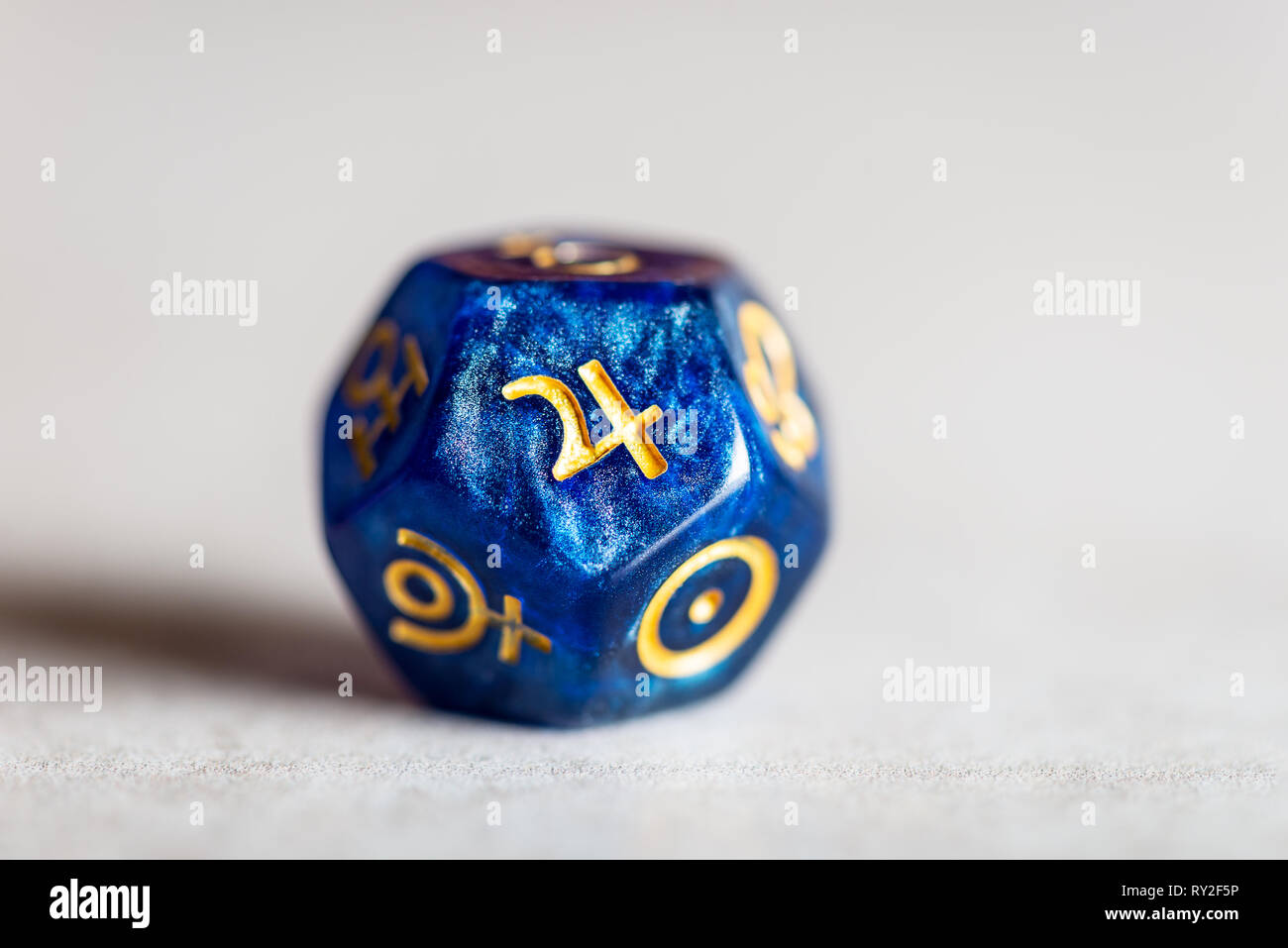 Astrology Dice with symbol of the planet Jupiter on grey background ...