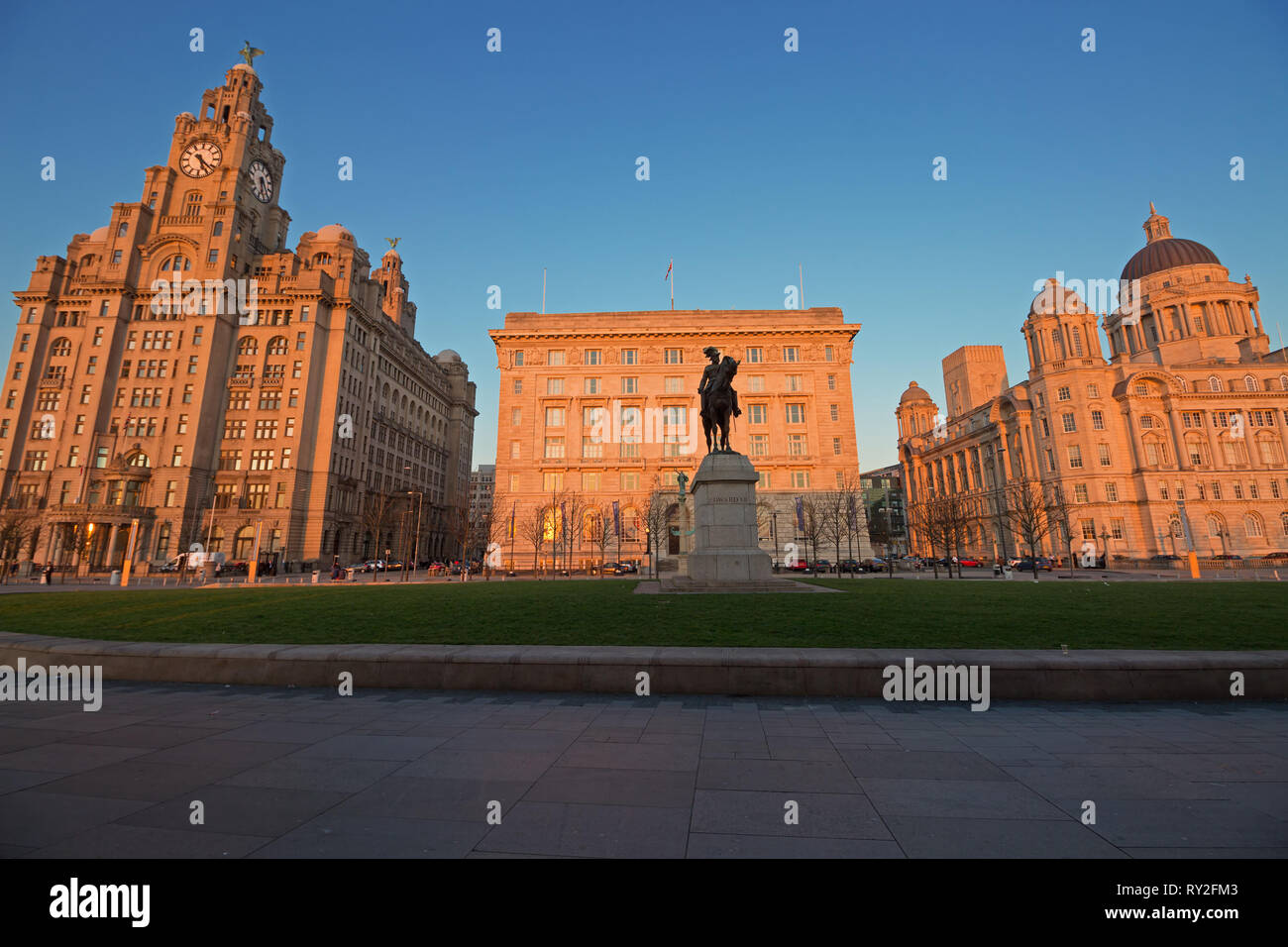 Liverpool's historic waterfront buildings in warm late evening sunshine ...