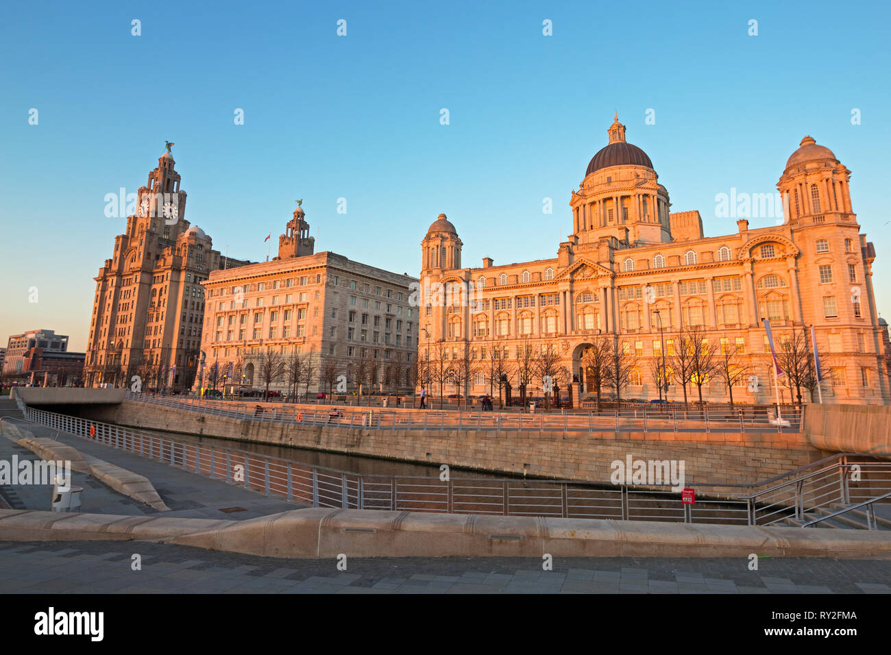 Liverpool's historic waterfront buildings in warm late evening sunshine ...