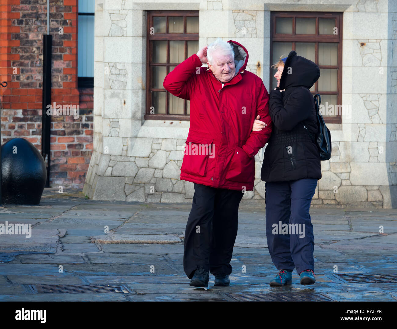 Woman walking windy hi-res stock photography and images - Alamy