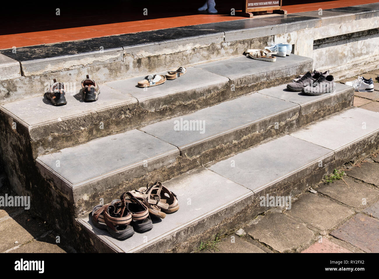 Footwear outside temple hi-res stock photography and images - Alamy