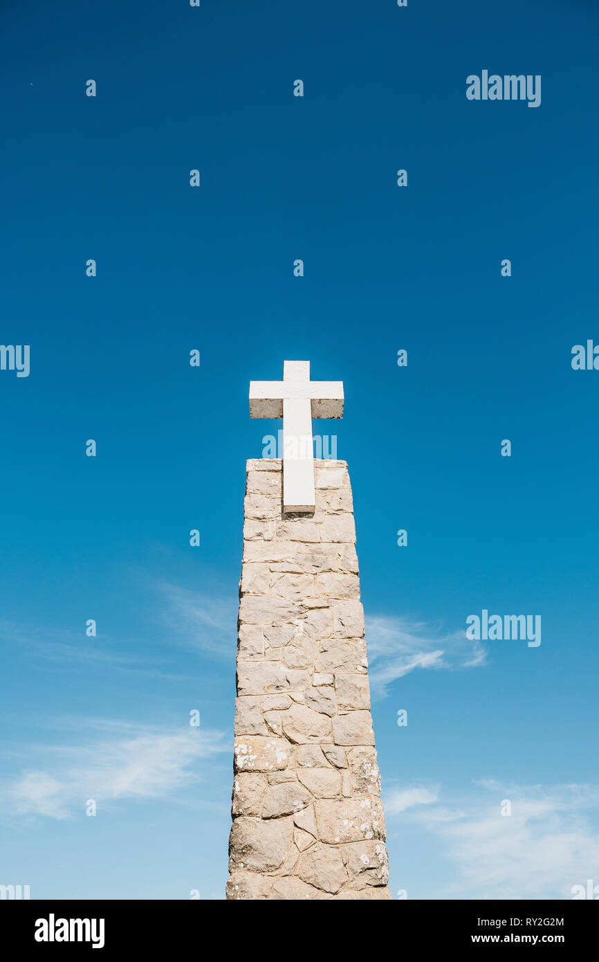 A beautiful view of the Christian Cross at Cape Roca in Sintra in ...