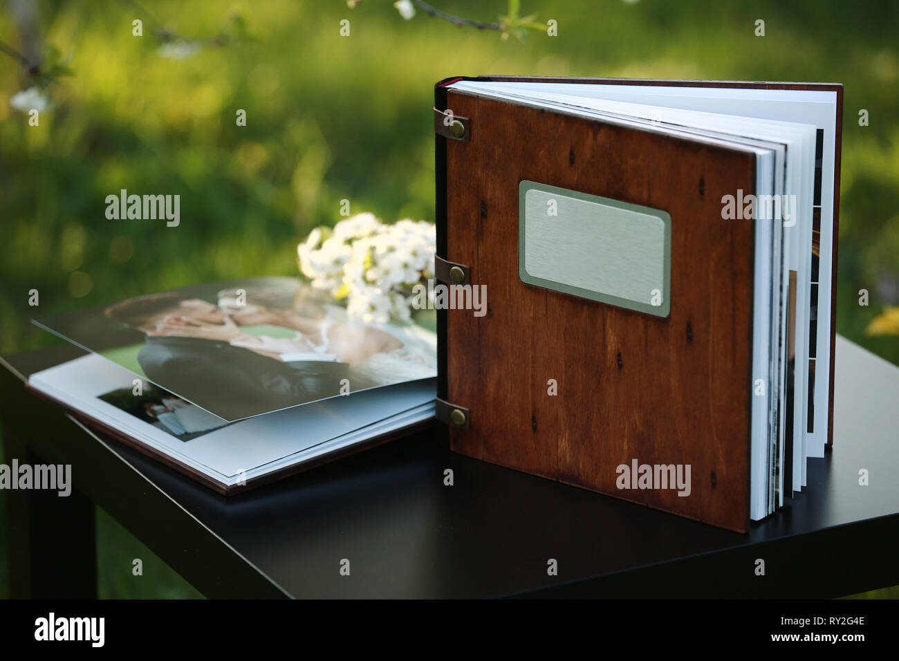 wooden photobook on the table Stock Photo - Alamy