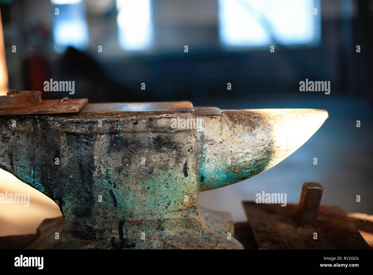 Old anvil in the blacksmith shop. Close-up of a metal tool Stock Photo ...