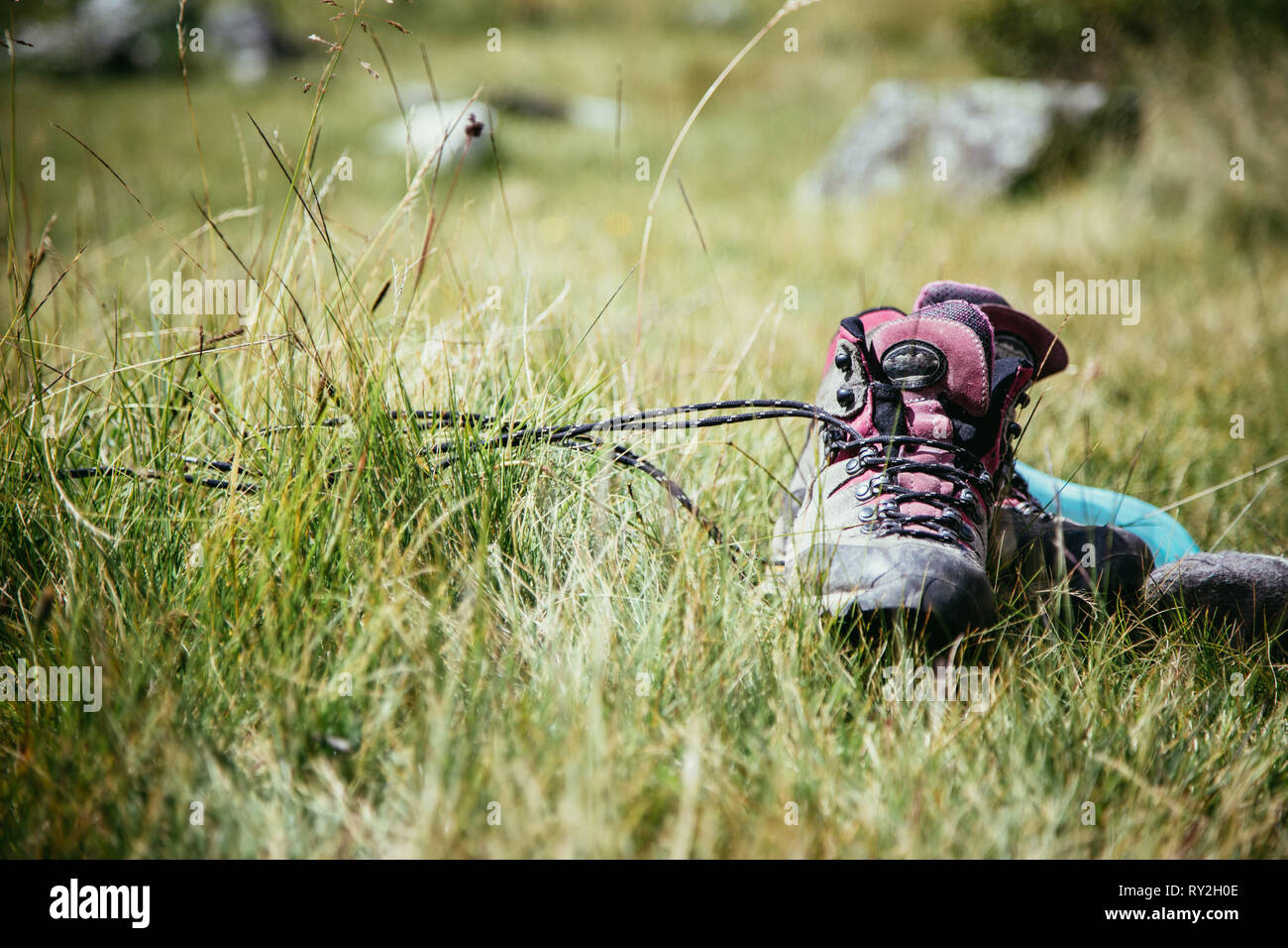 Alpine boots in grass hi-res stock photography and images - Alamy