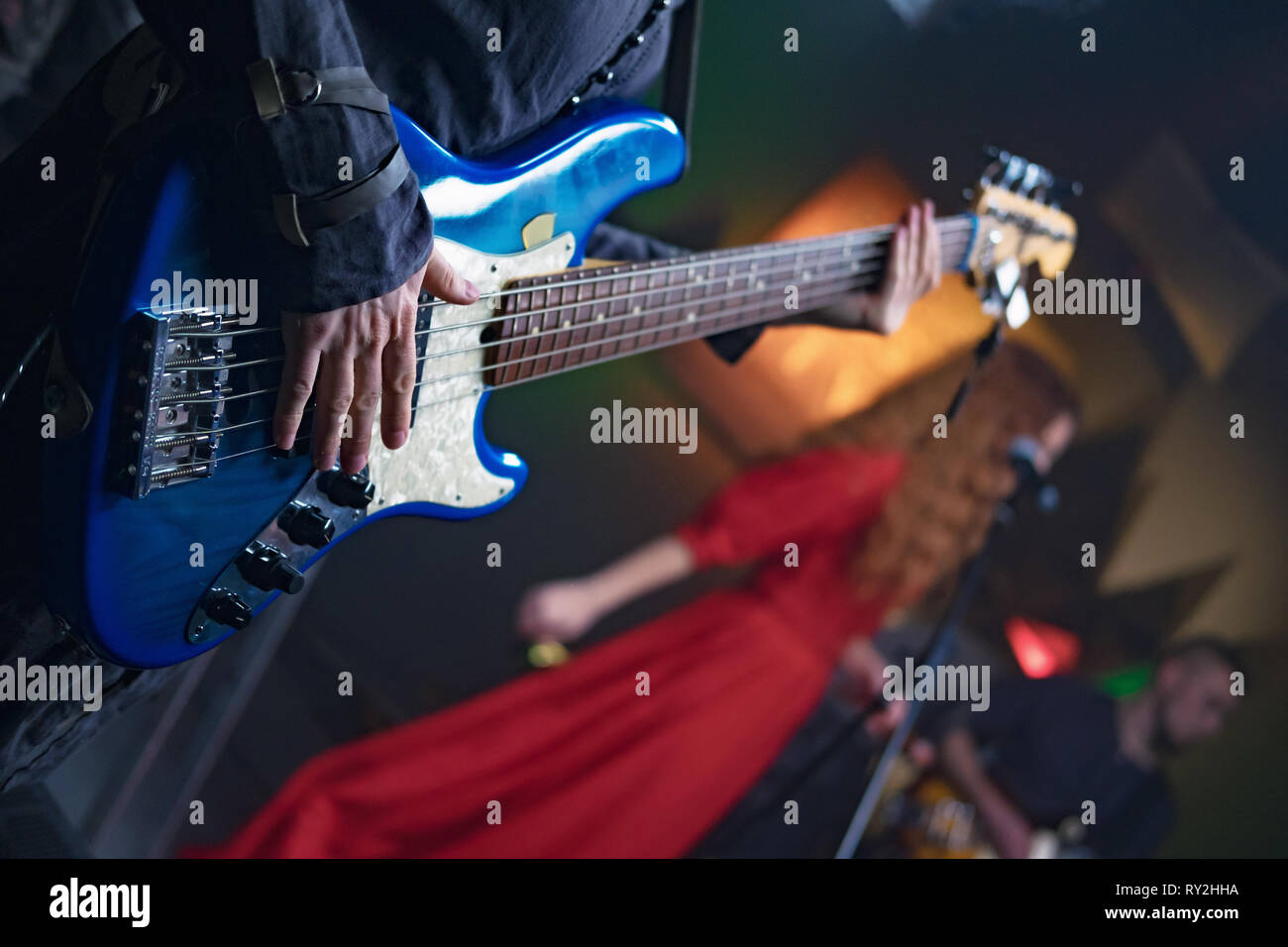 Electrical bass guitar in male hi-res stock photography and images - Alamy