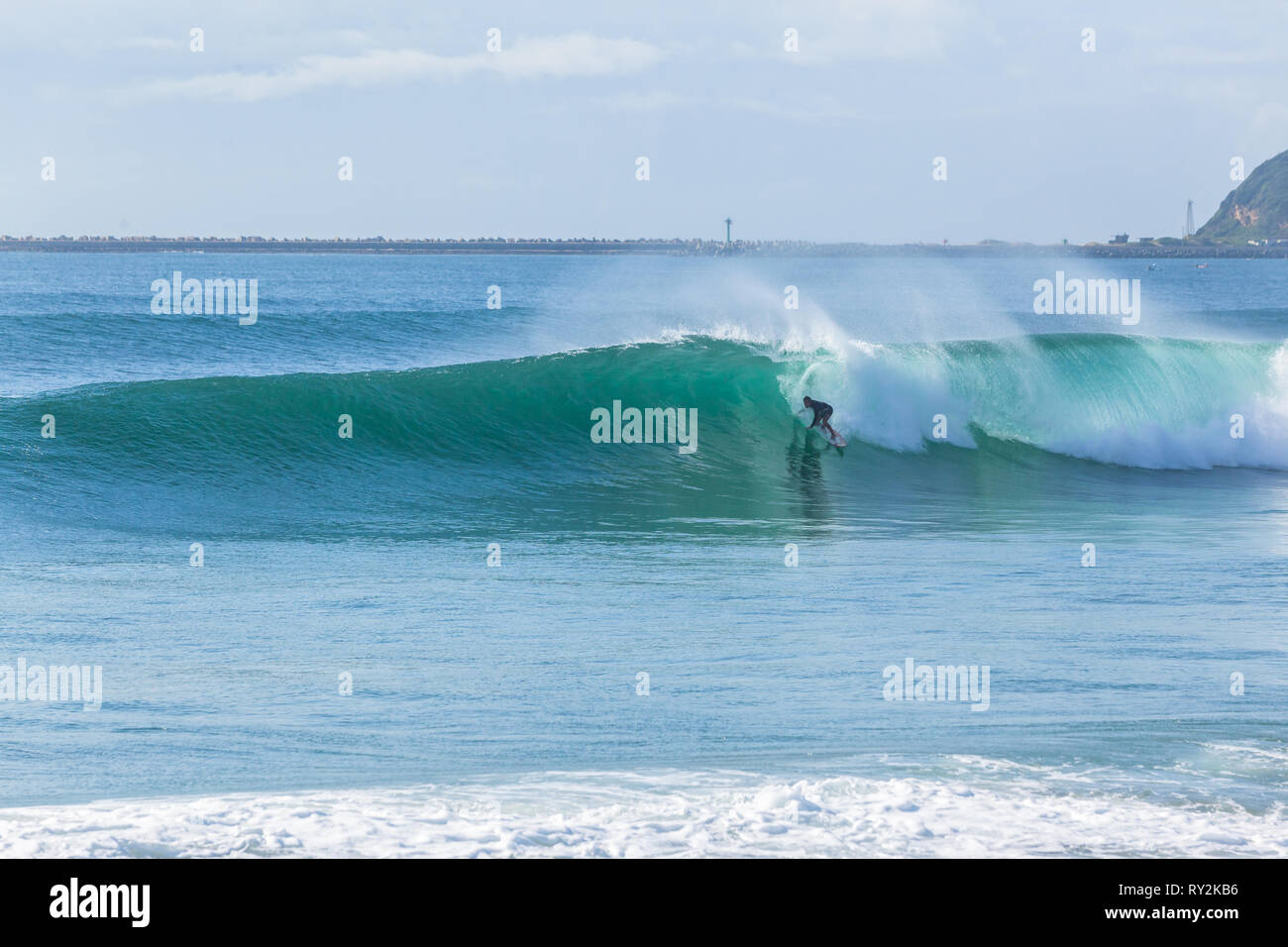 Surfer surfing tube ride turns hollow ocean wave a sporting lifestyle ...