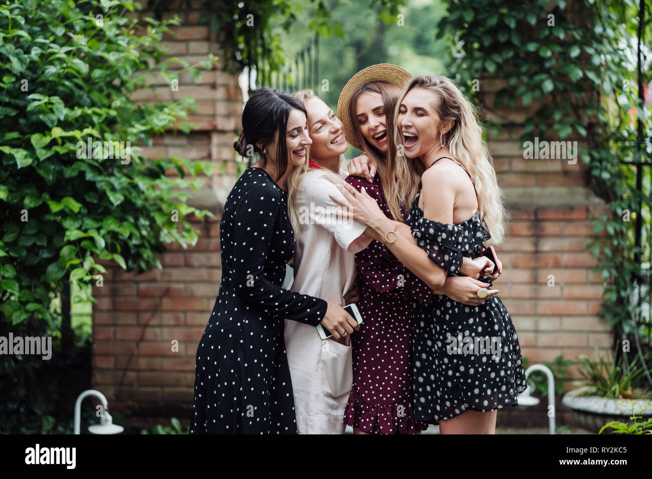 Four girls are having fun Stock Photo - Alamy