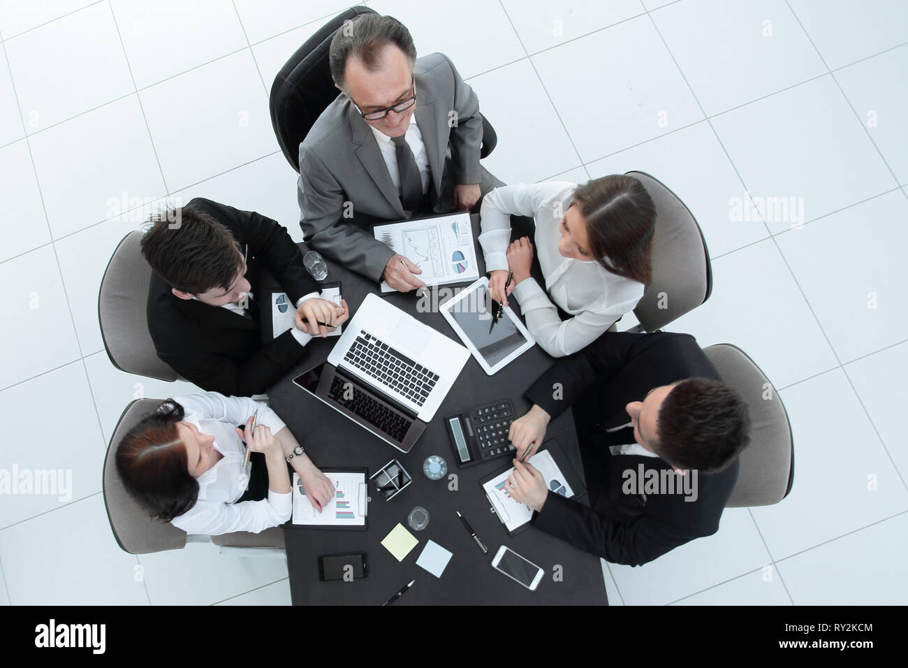 top view.business team working with financial charts Stock Photo - Alamy