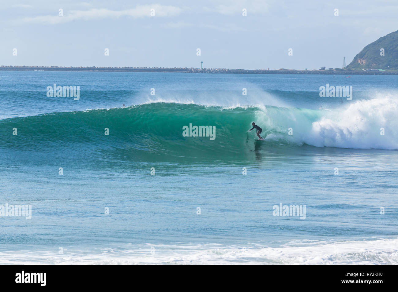 Surfer surfing tube ride turns hollow ocean wave a sporting lifestyle ...