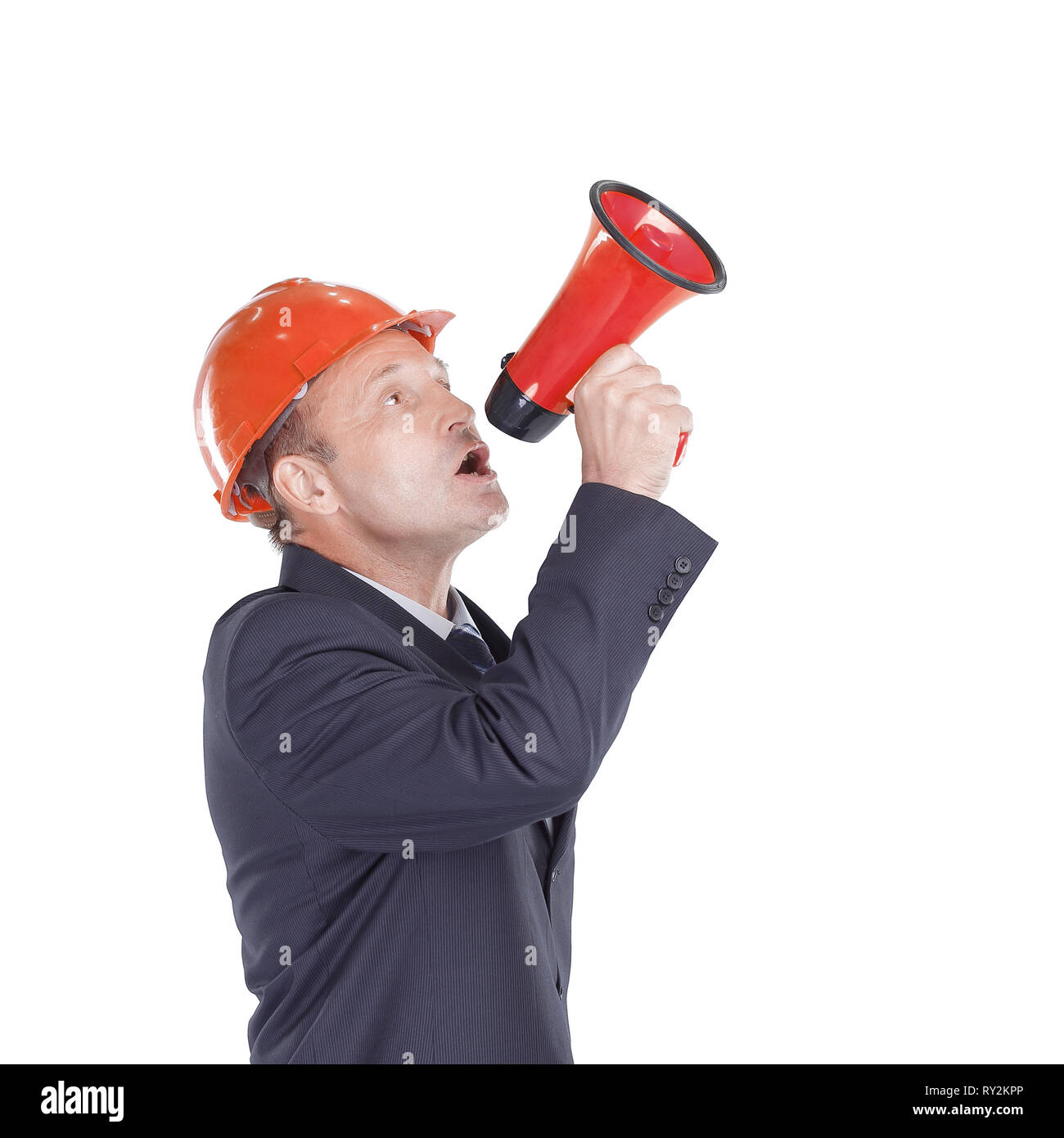 serious engineer with a screaming megaphone. photo with copy space ...